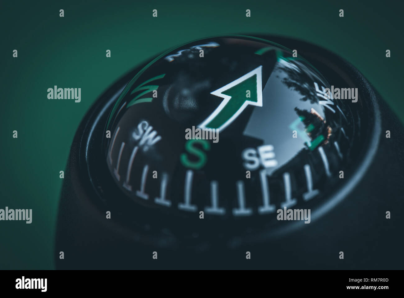 compass on dark green background - direction concept to be taken Stock ...