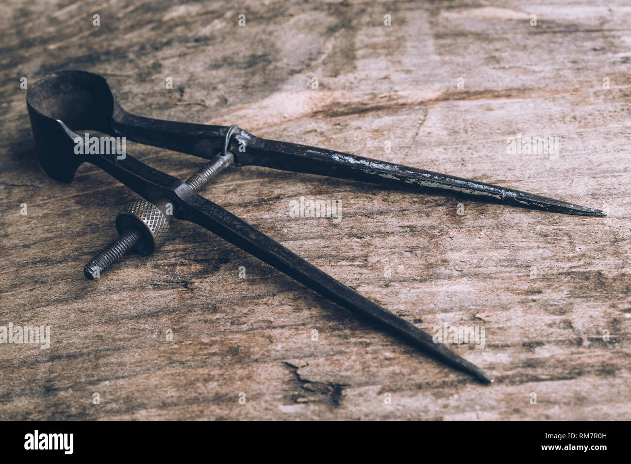 old compass tool to draw curves - ancient crafted work concept Stock ...