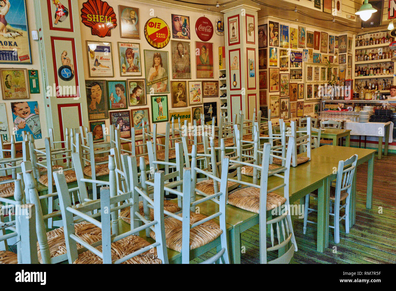 tavern decorated with hundreds of advertising plate in Psiri district ...