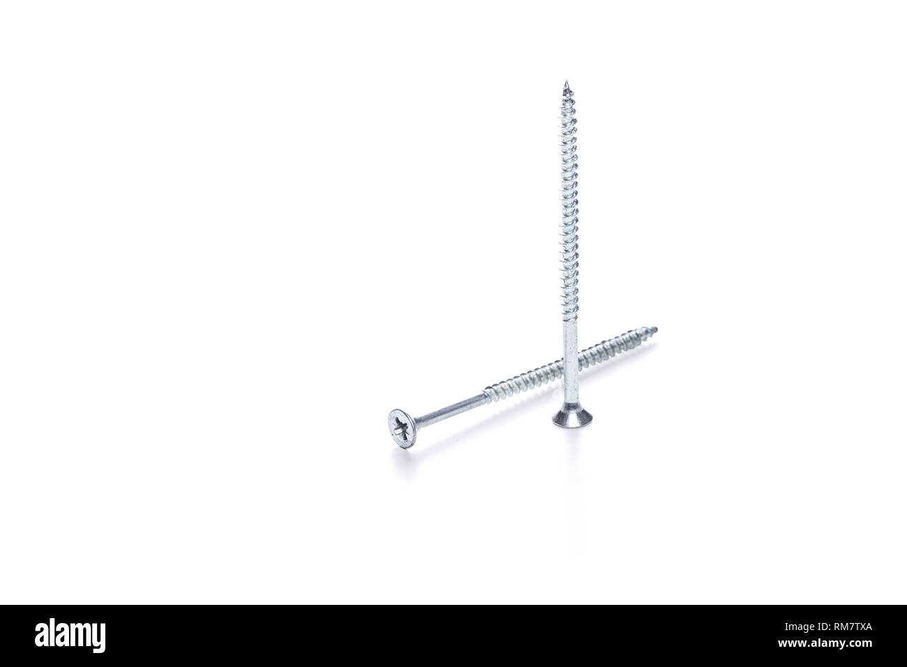 Photo of long two screws Stock Photo - Alamy