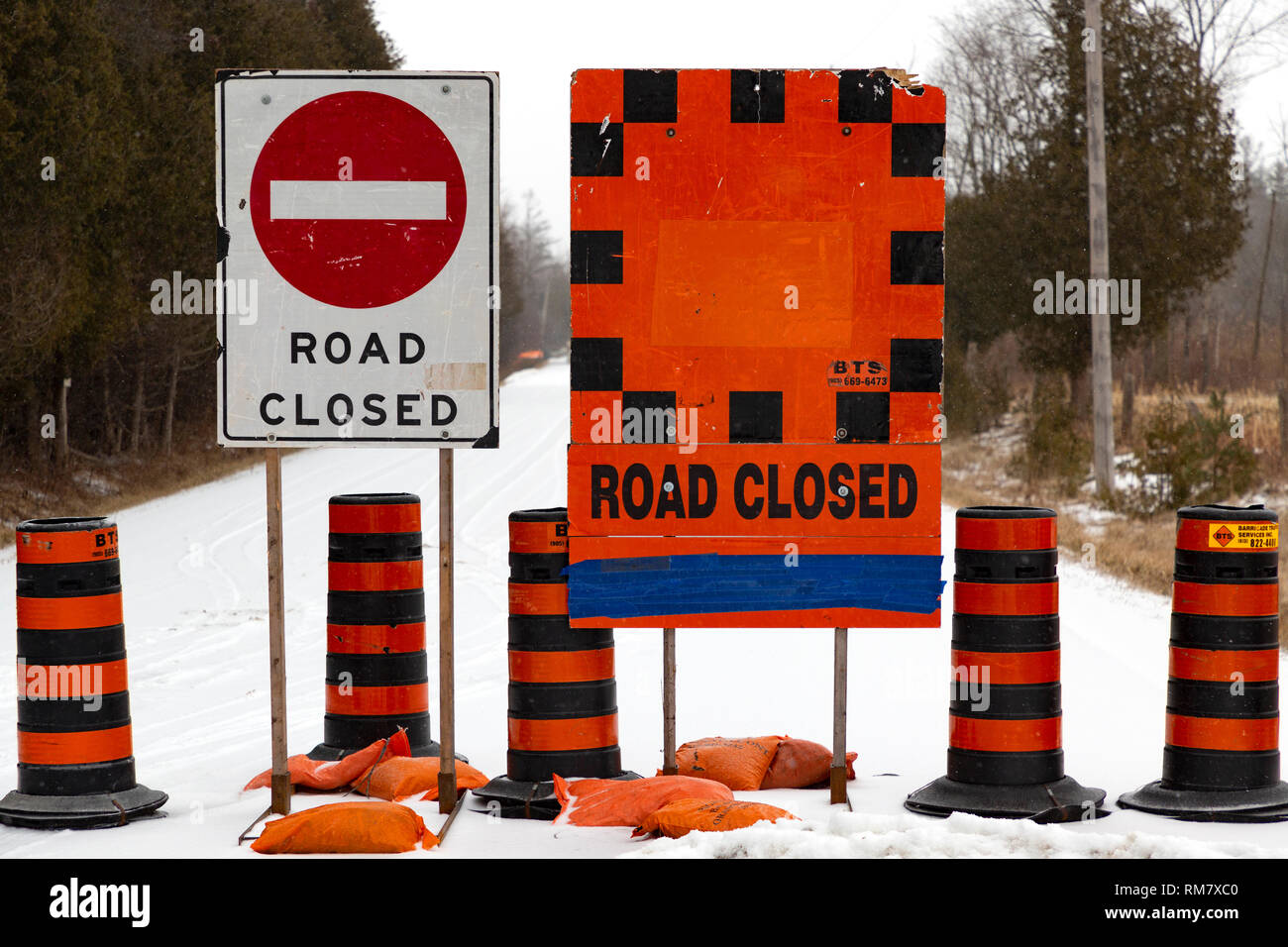 Road closed sign in winter Stock Photo - Alamy
