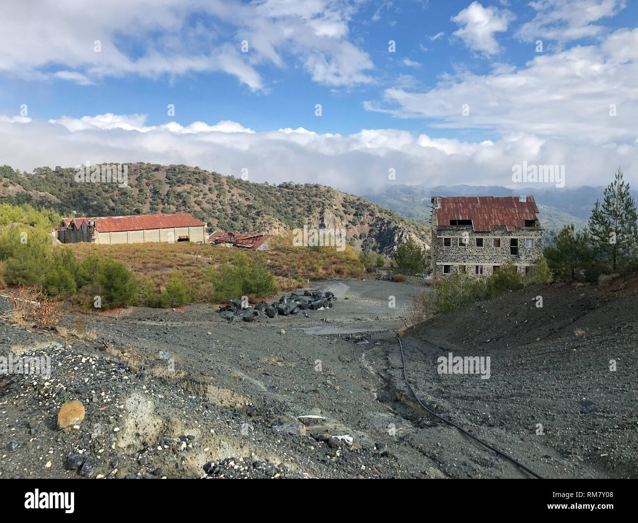 Panorama of Amiantos abandoned asbestos mine with signs of ongoing ...