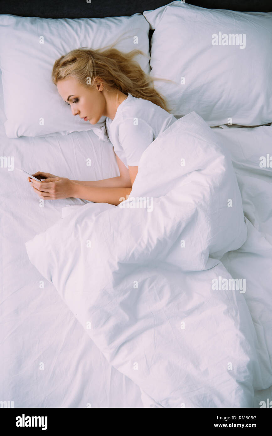Lonely woman lying hi-res stock photography and images - Alamy
