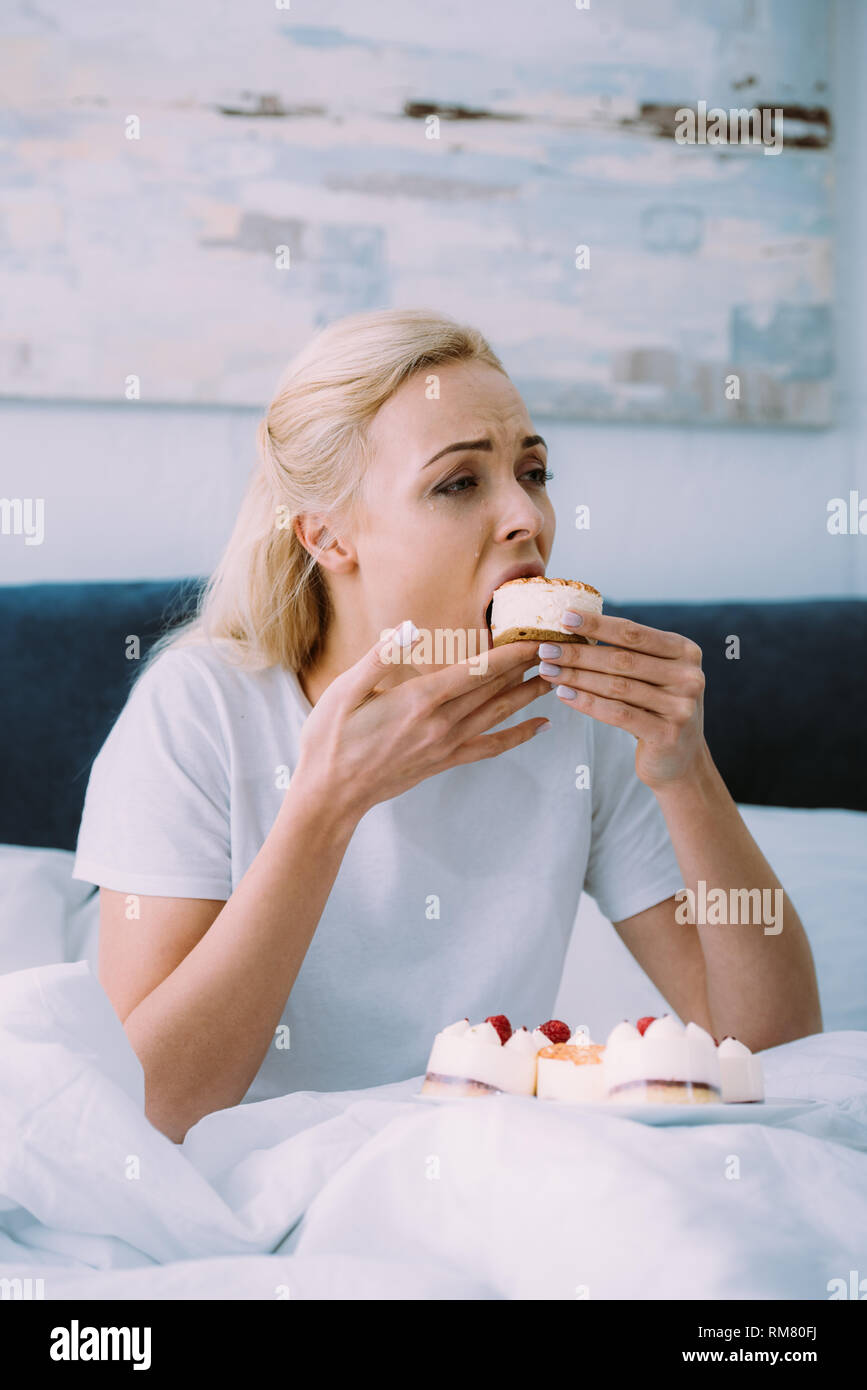 Sad woman eating alone hi-res stock photography and images - Alamy