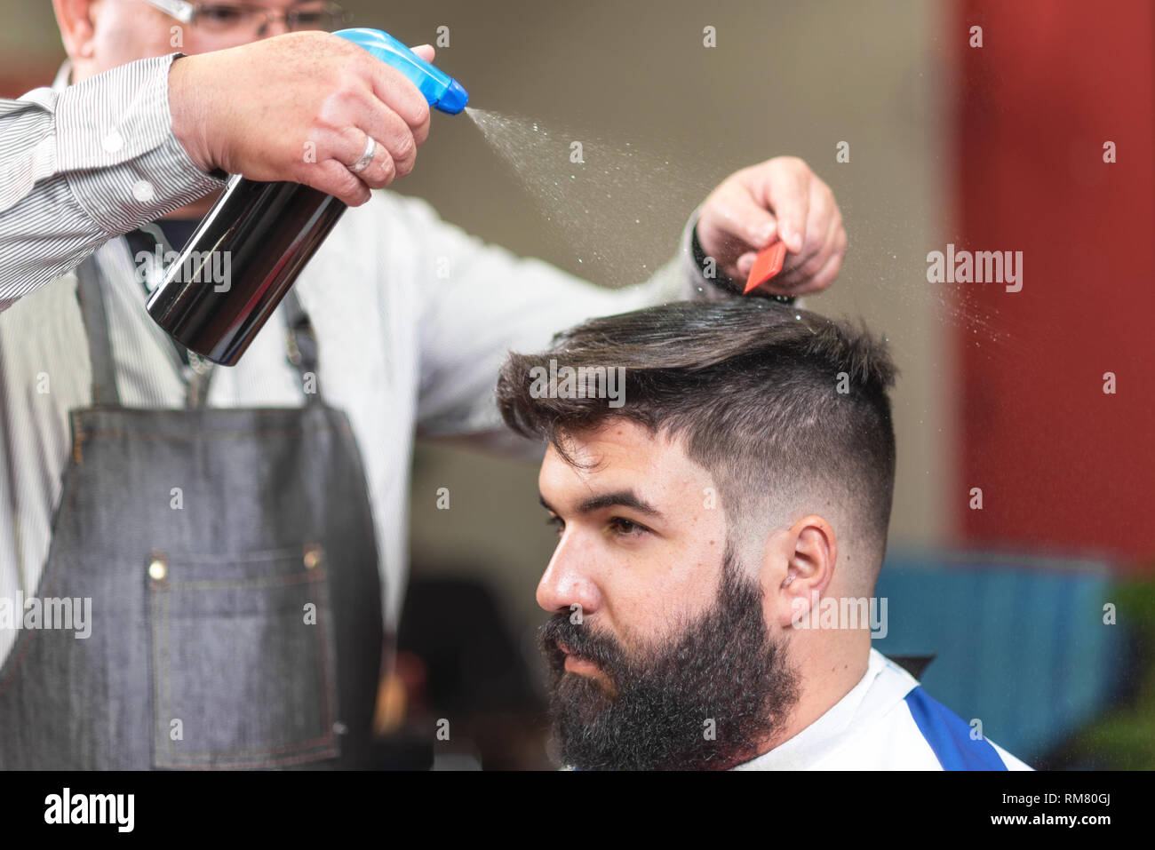 Young man barber shop preparing hi-res stock photography and images - Alamy