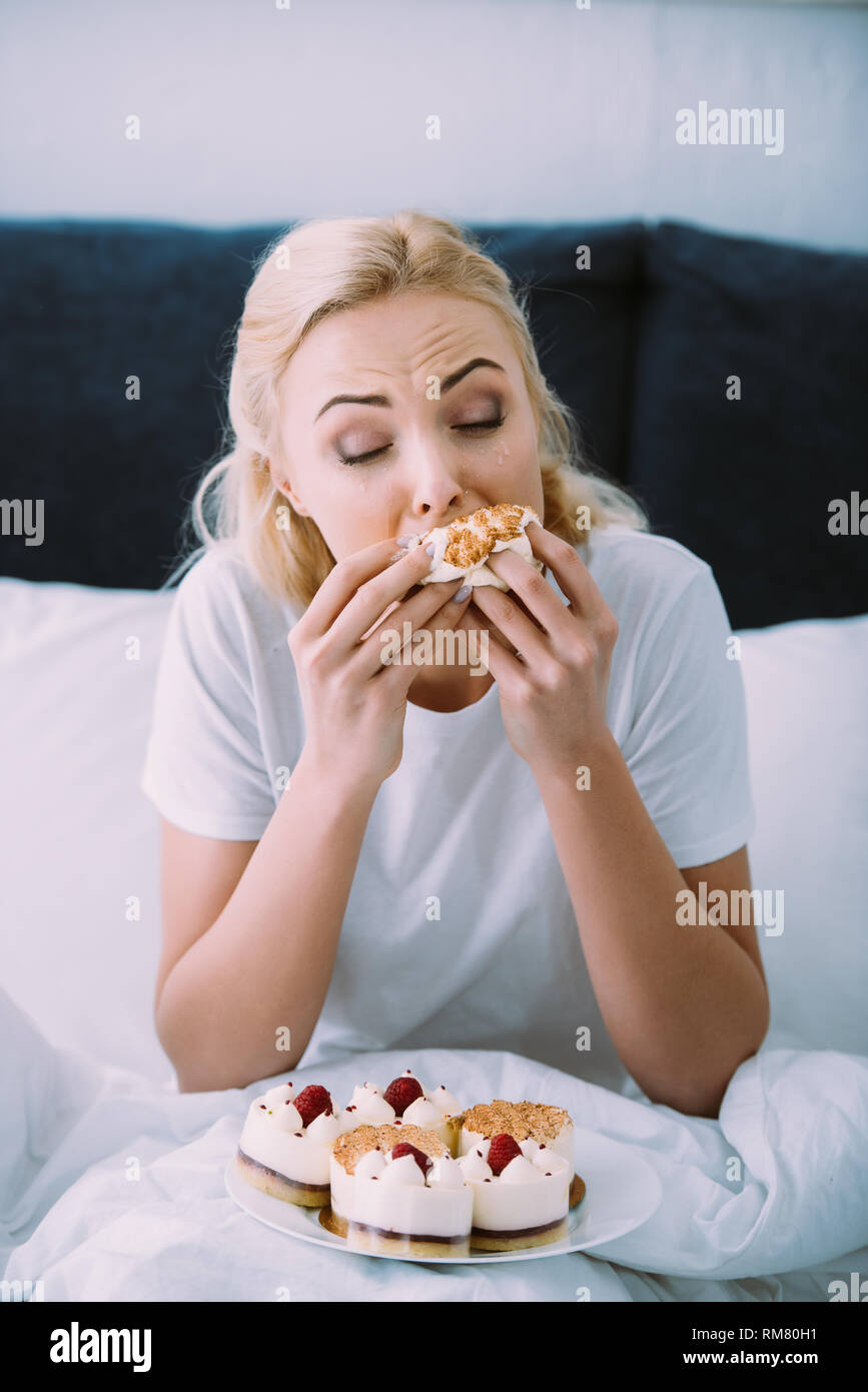 Sad woman eating alone hi-res stock photography and images - Alamy