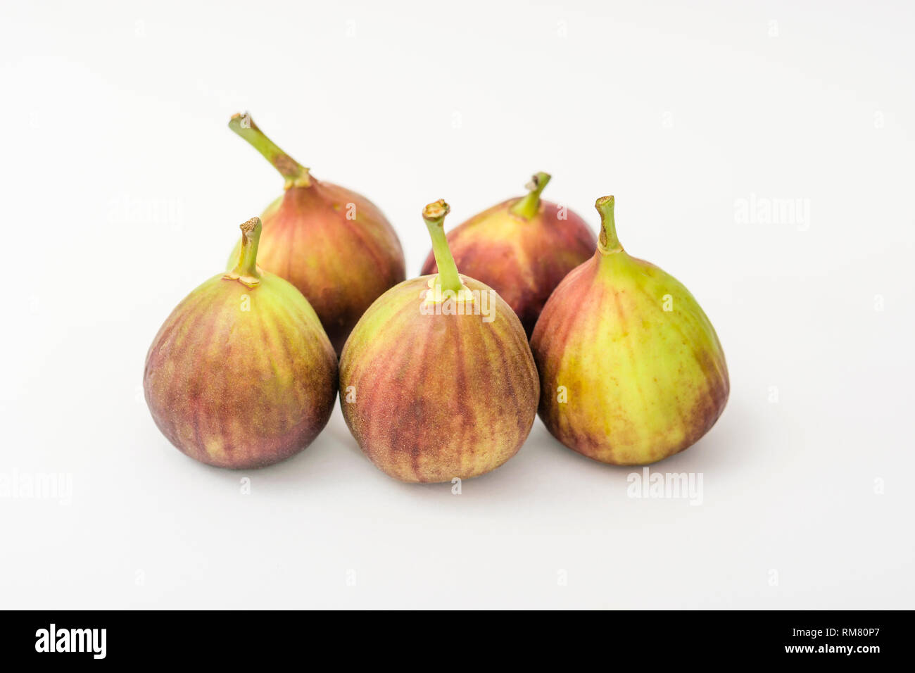 Fresh whole figs on a white background Stock Photo - Alamy