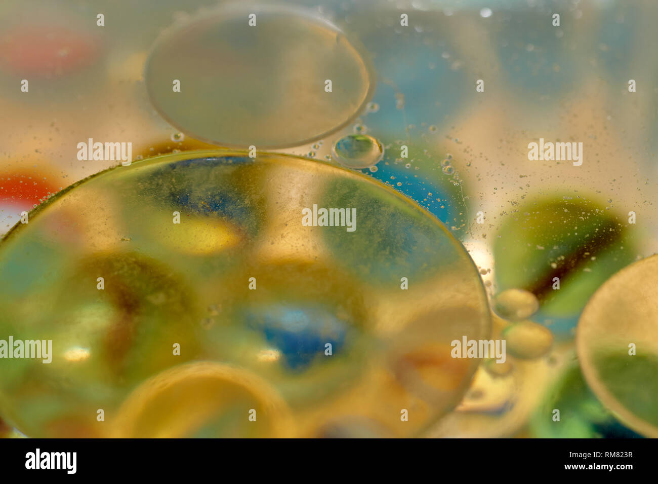 floating in the water abstract colorful, yellow oil drops Stock Photo ...