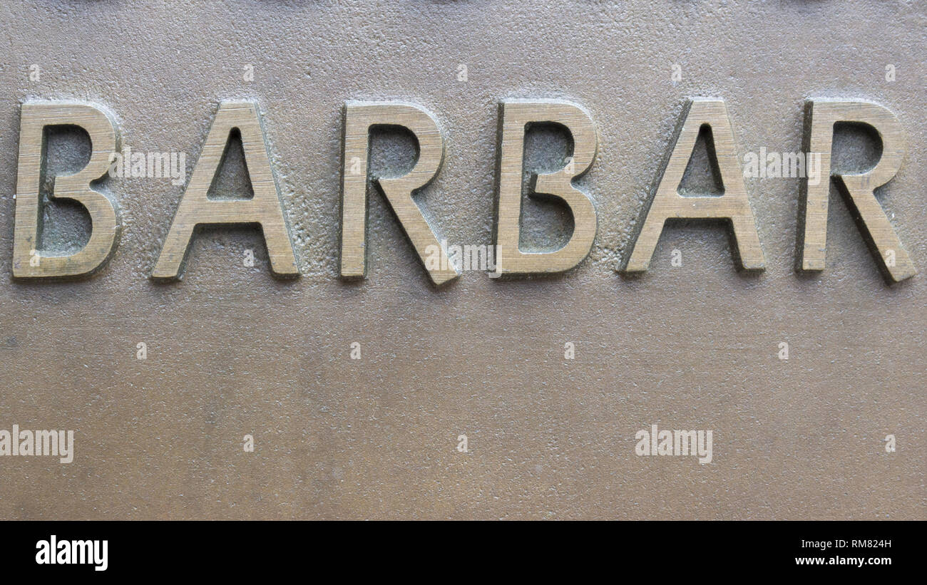 Barbar - inscription on the wall of metal iron plastic letters Stock ...