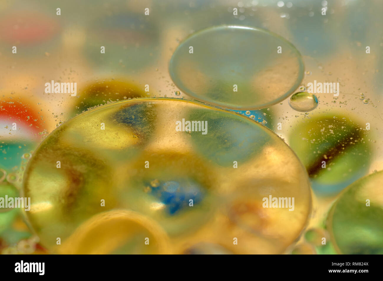 floating in the water abstract colorful, yellow oil drops Stock Photo ...