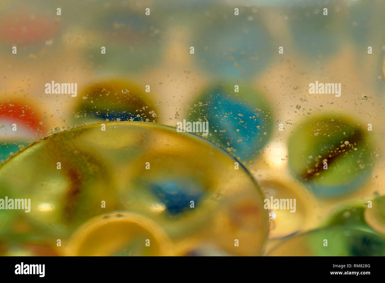 floating in the water abstract colorful, yellow oil drops Stock Photo ...