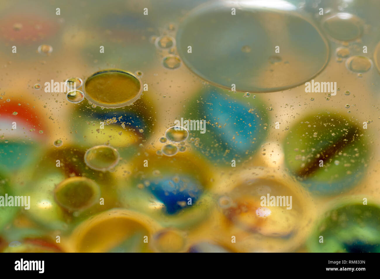 floating in the water abstract colorful, yellow oil drops Stock Photo ...