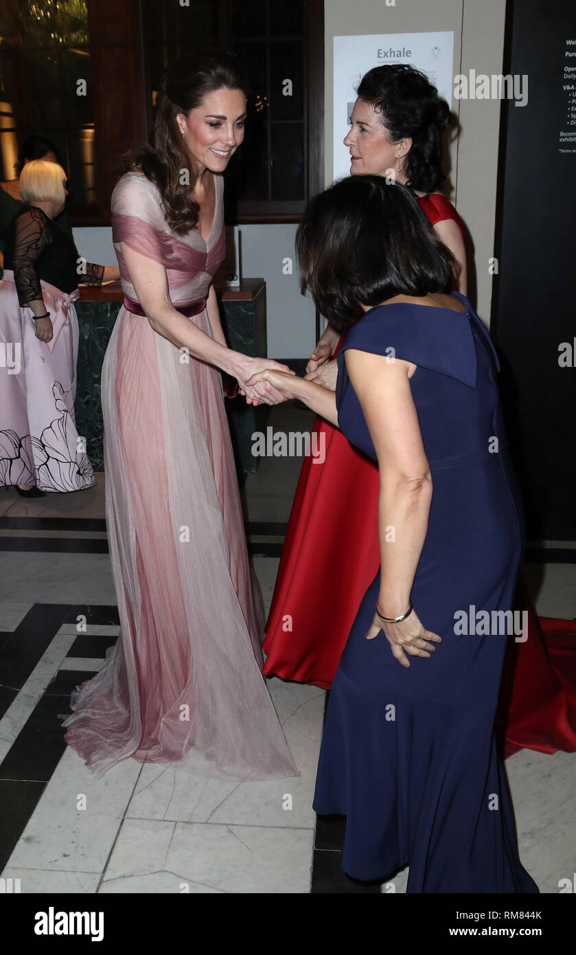 The Duchess of Cambridge with Amanda Pullinger (red dress), Chief ...