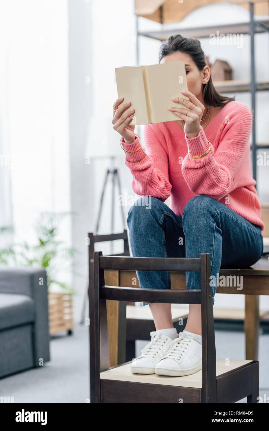 female student with bindi reading book at home Stock Photo - Alamy