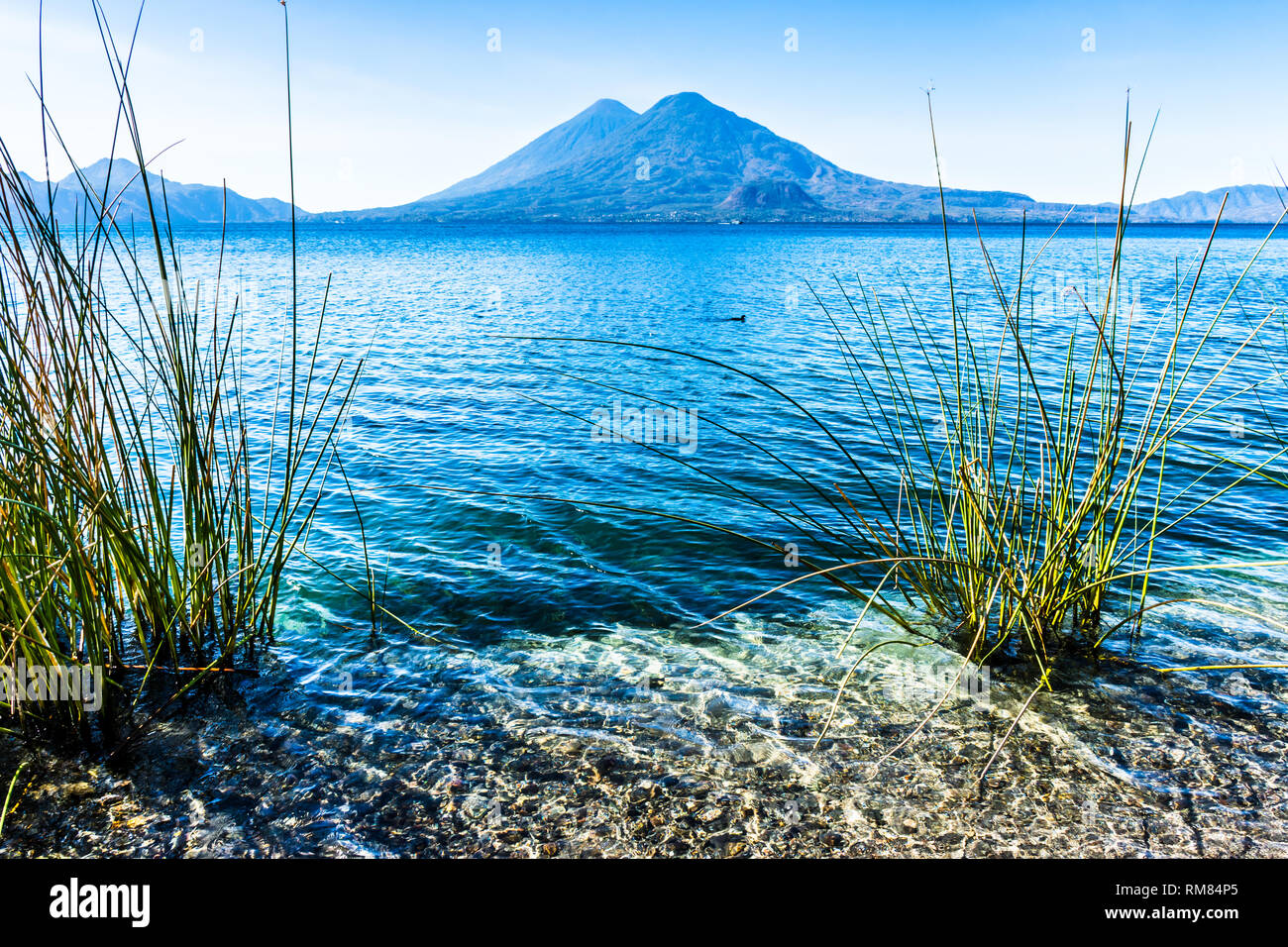 Atitlan & Toliman volcanoes on Lake Atitlan in Guatemalan highlands ...