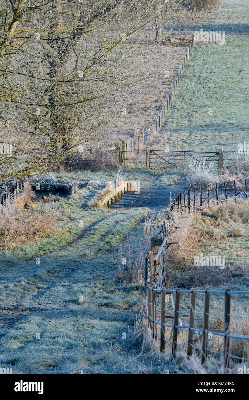 River windrush through sherborne estate in the winter frost. Sherborne ...