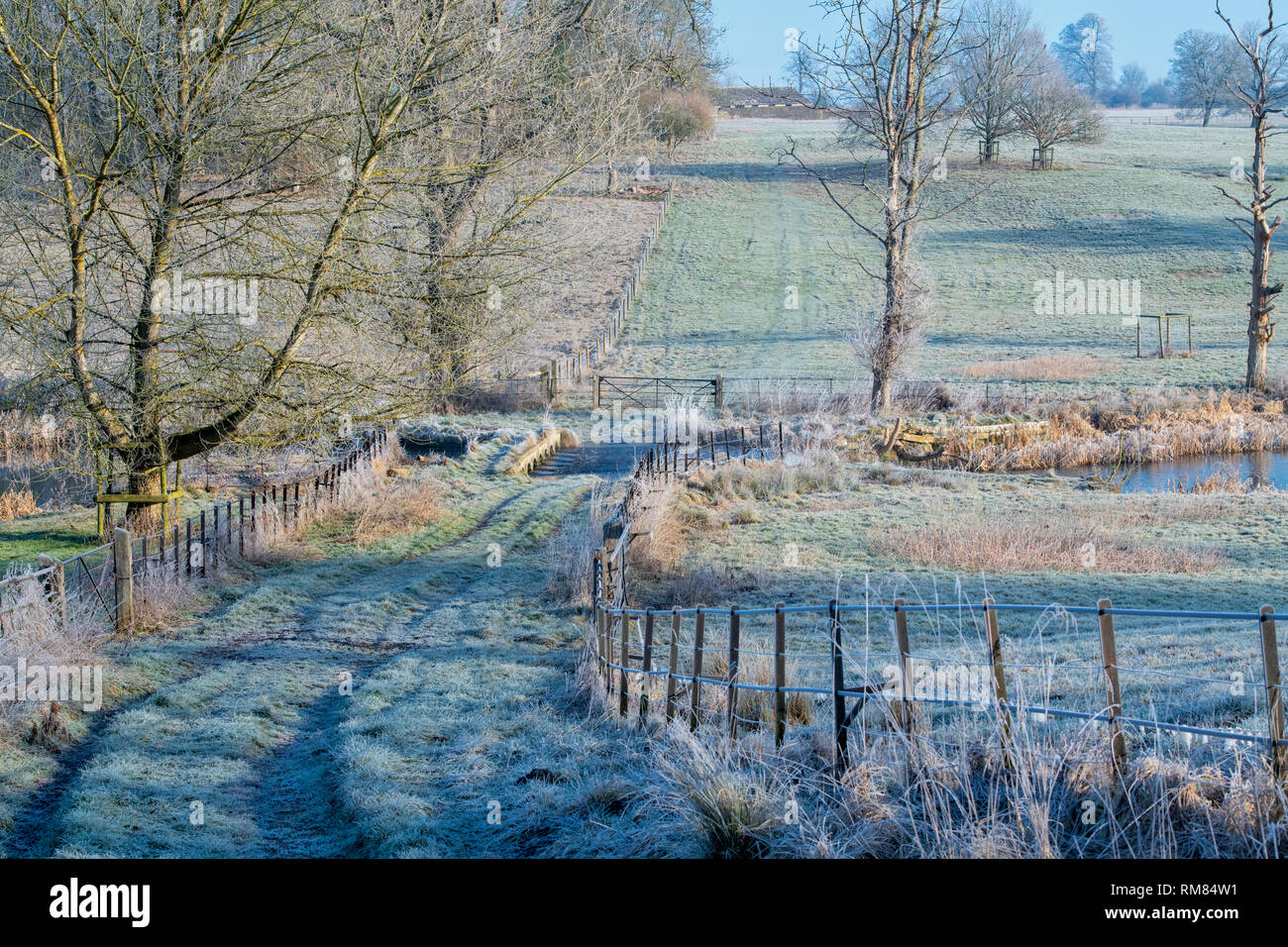 River windrush through sherborne estate in the winter frost. Sherborne ...