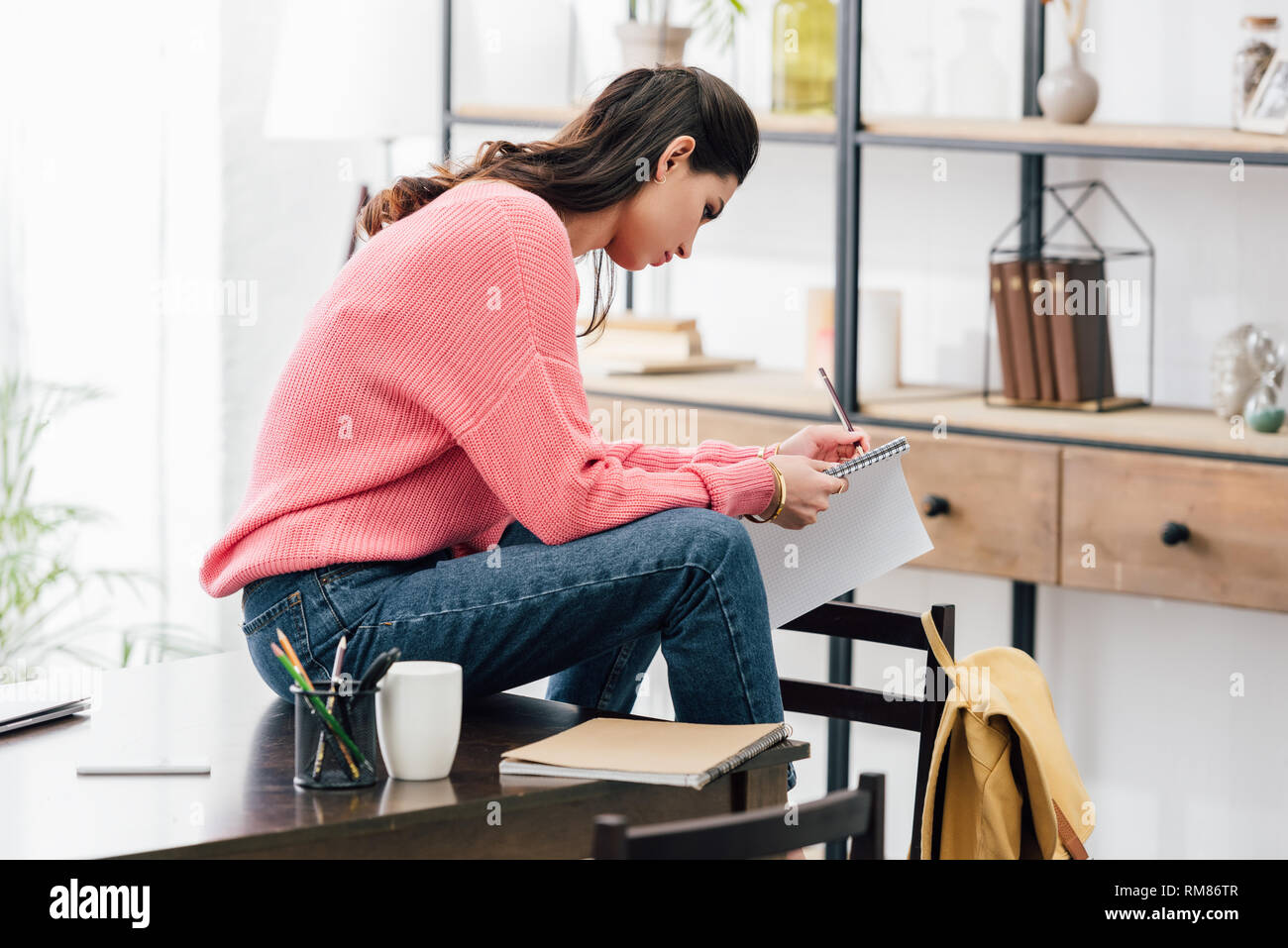 Indian girl writing hi-res stock photography and images - Alamy