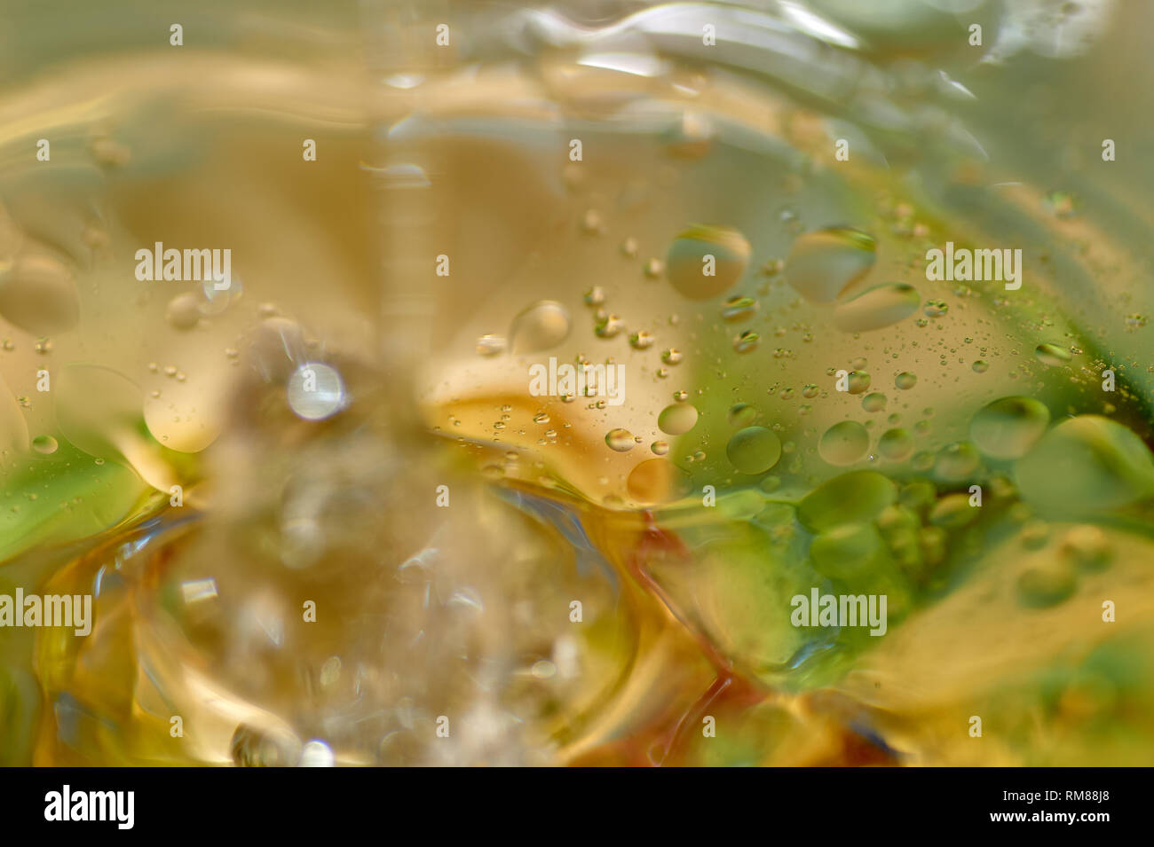 floating in the water abstract colorful, yellow oil drops Stock Photo ...
