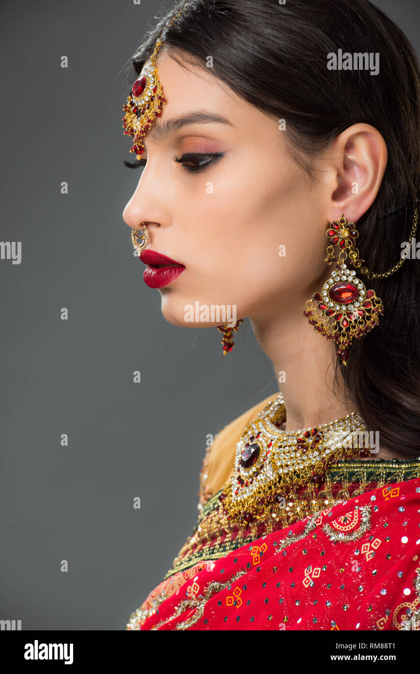 beautiful indian woman posing in traditional clothing and bindi ...