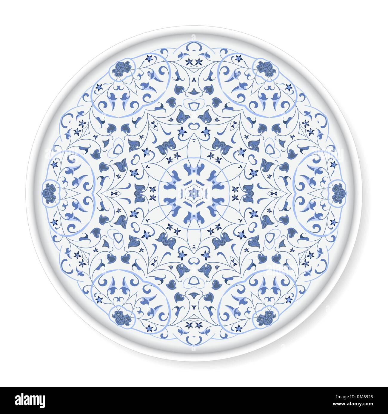 Decorative plate with a circular blue pattern, top view. White ...