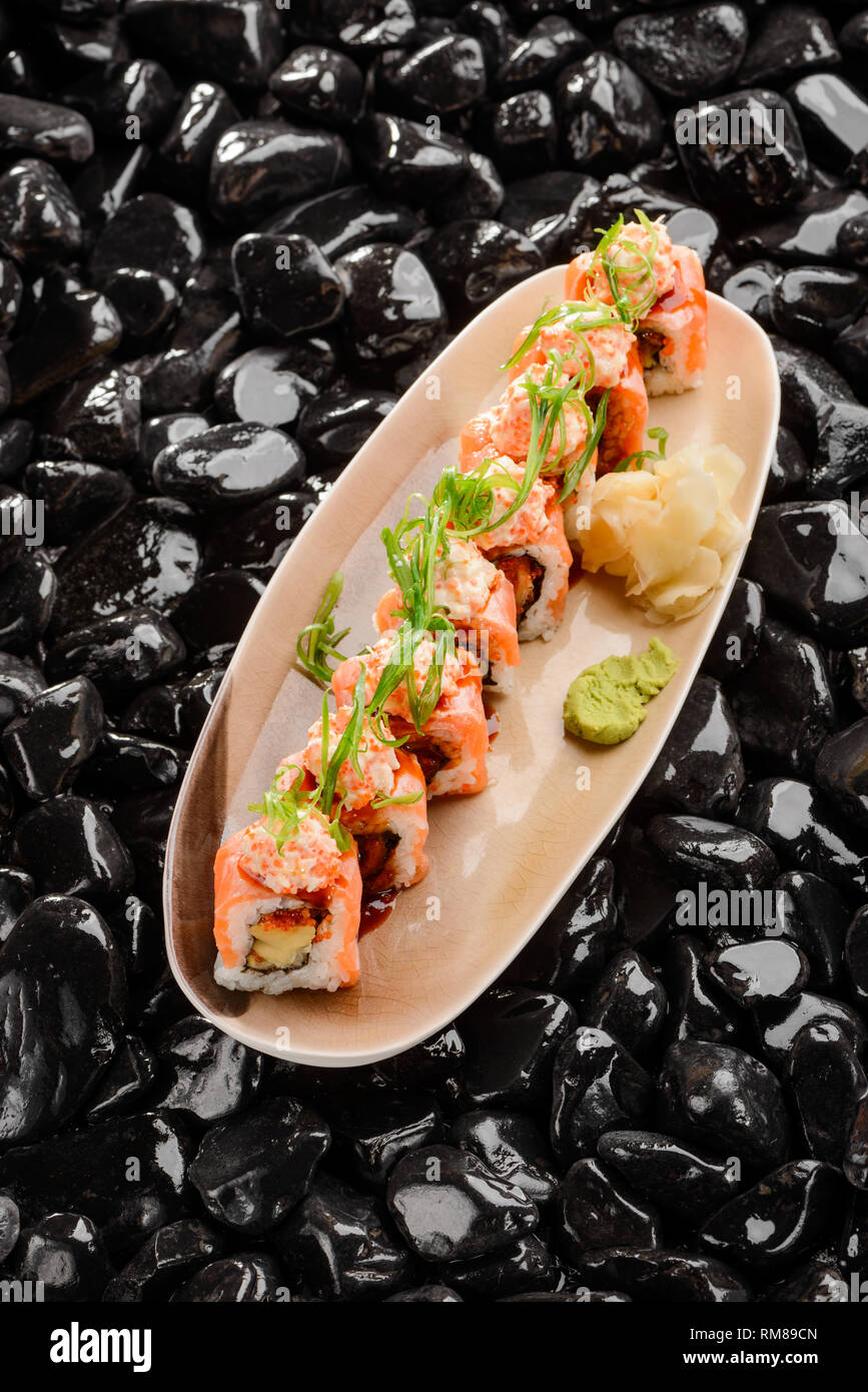 Salmon rolls with flying fish Stock Photo - Alamy