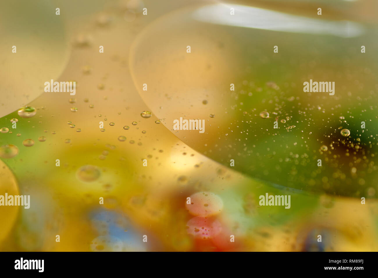 floating in the water abstract colorful, yellow oil drops Stock Photo ...