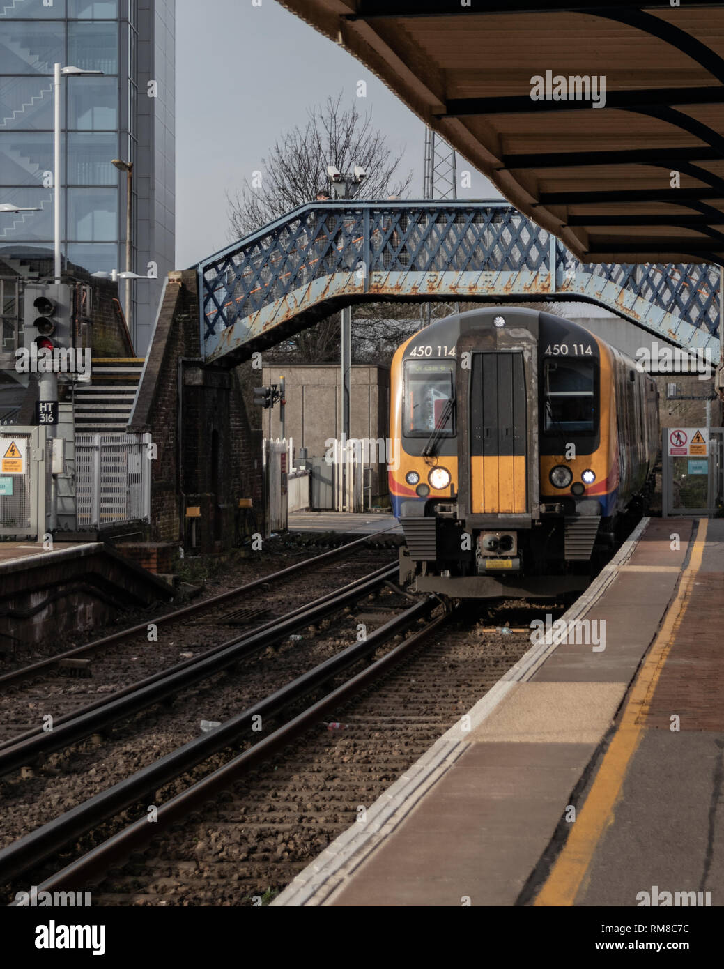 British Train arriving at a typical English railway station Stock Photo ...