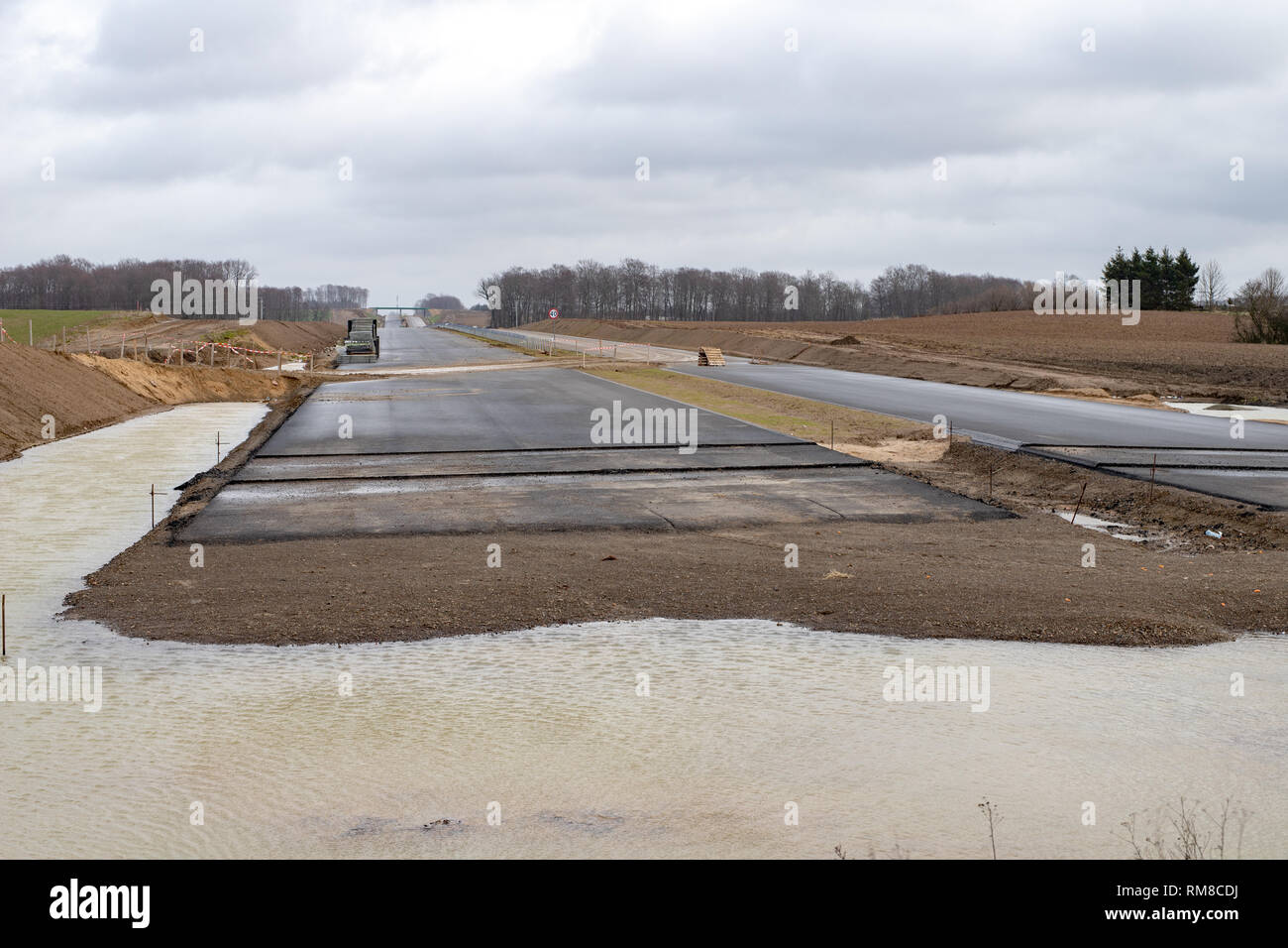 Construction of a new two-lane road. Construction site in central ...