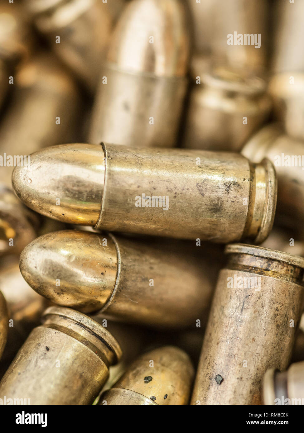 Top detail macro view of large group of gun bullets. Ammunition ...