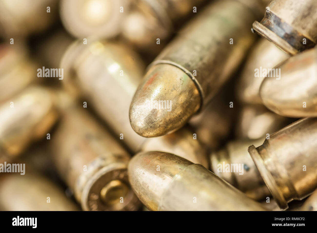 Top detail macro view of large group of gun bullets. Ammunition ...