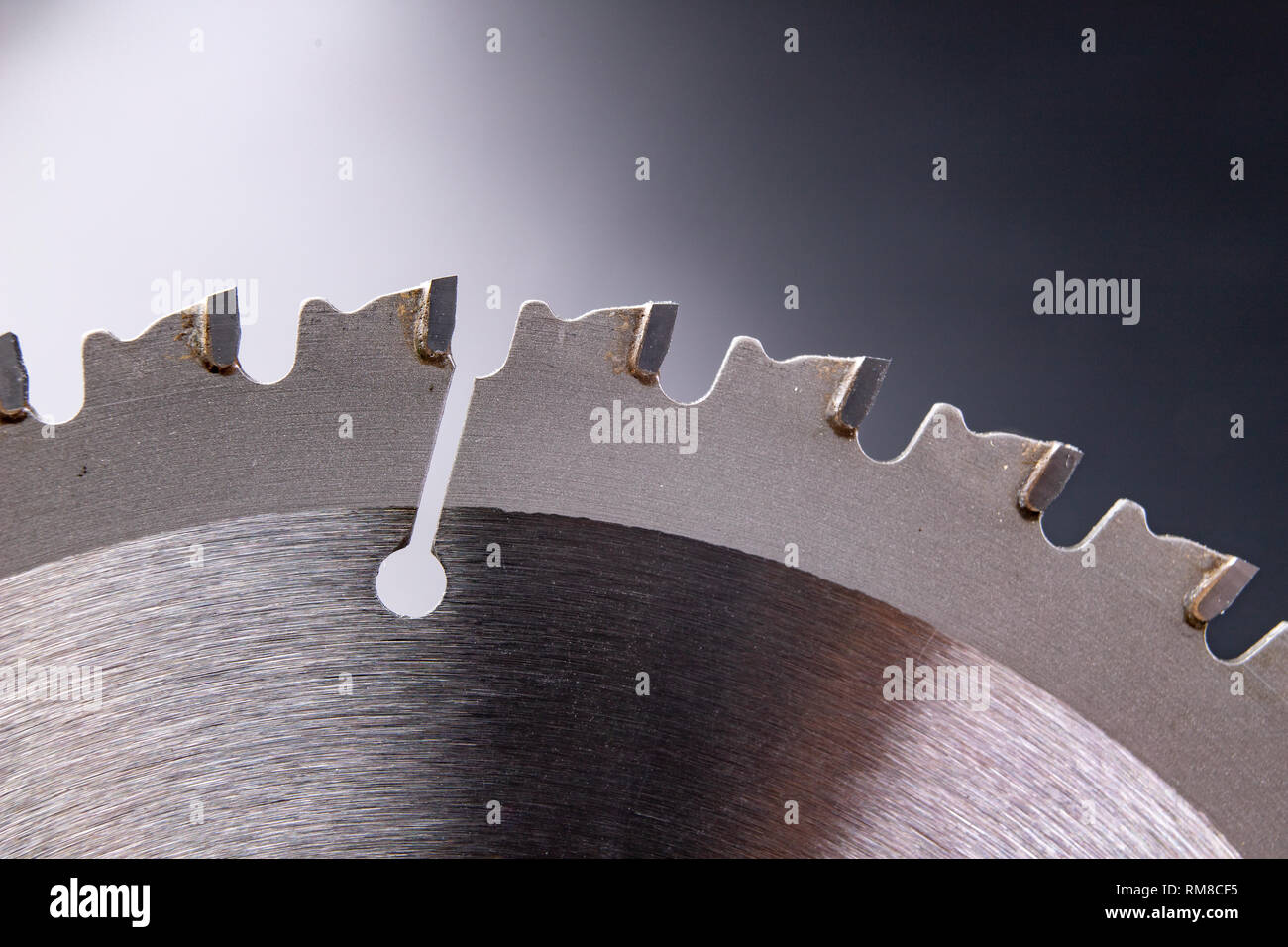 New aluminum cutting disc. Cutting knife for manual chainsaw. Dark ...