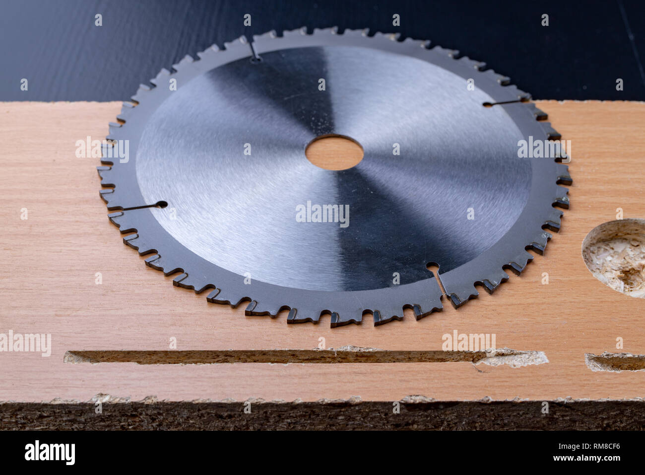 New aluminum cutting disc. Cutting knife for manual chainsaw. Dark ...