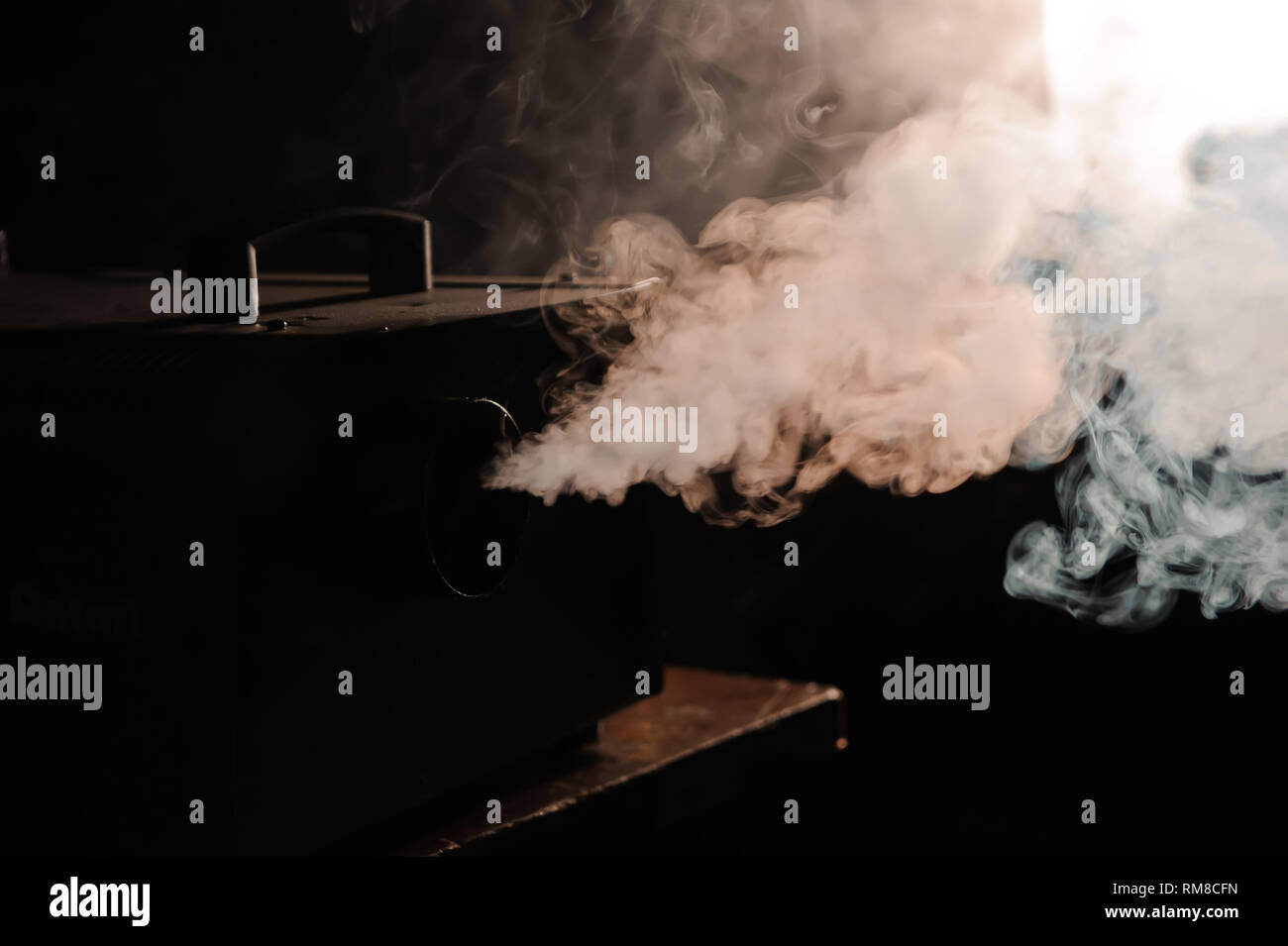 lights in smoke, studio lights shining through the smoke from smoke ...