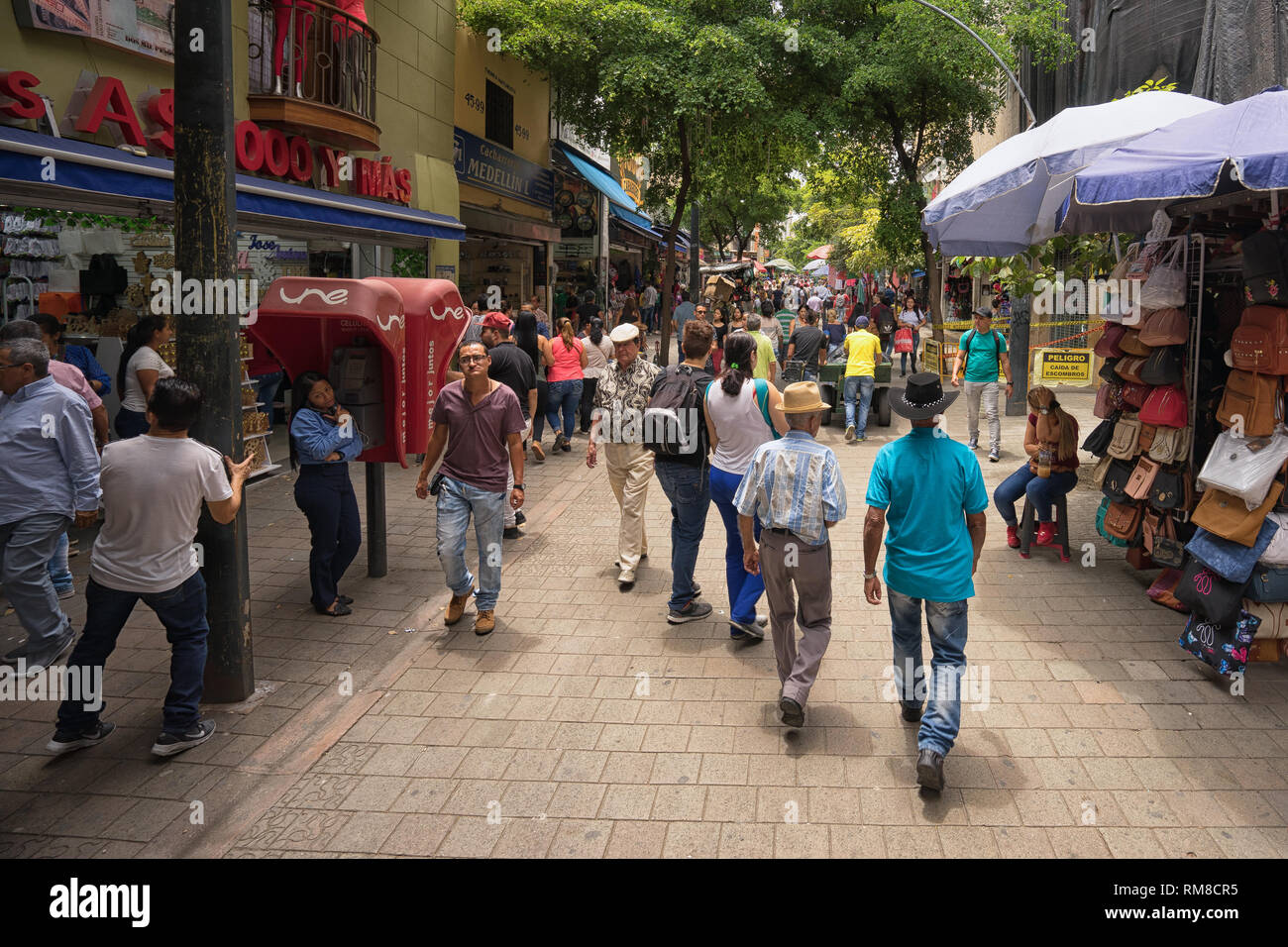 Medellin, Colombia - July 23, 2018: people walking on the street in the ...