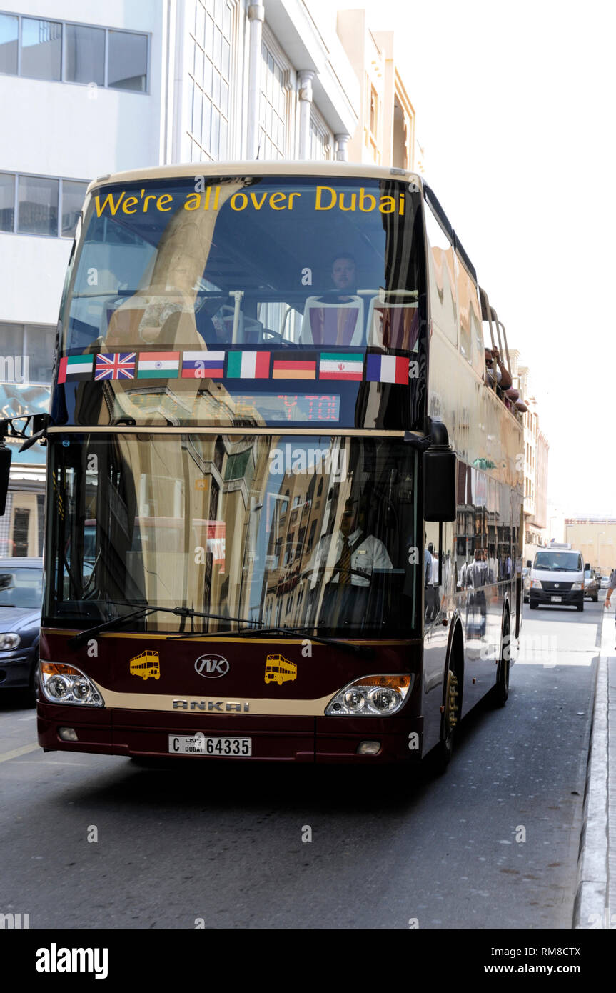A Dubai tourist bus in the streets of Dubai in the United Arab Emirates ...
