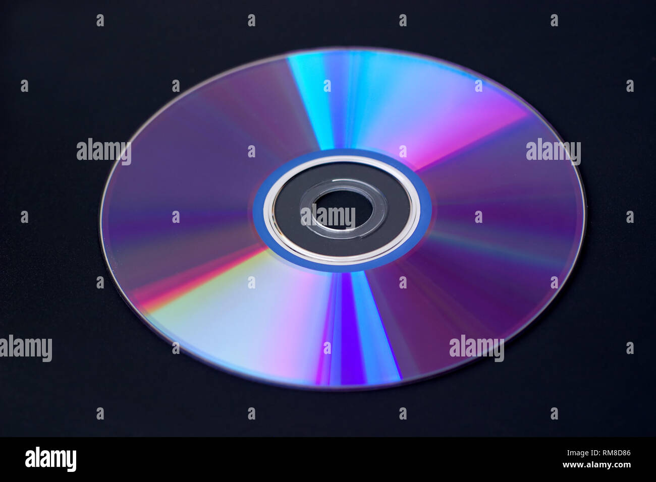 Stack of computer DVD disks isolated on black closeup Stock Photo - Alamy