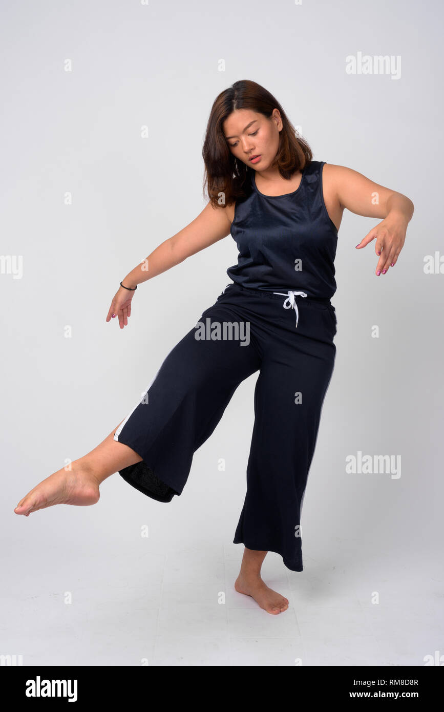Woman stand on one leg gym hi-res stock photography and images - Alamy