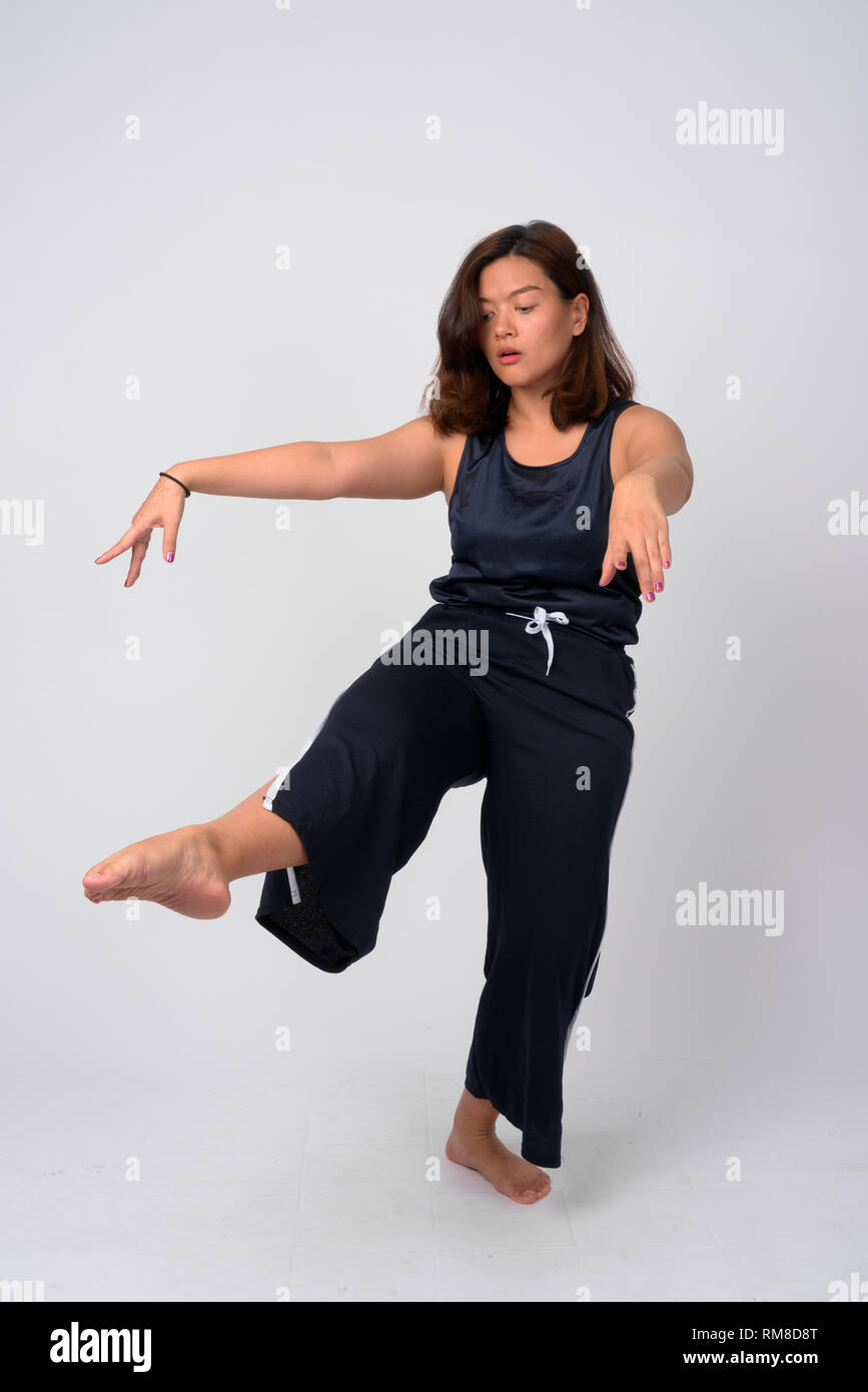 Woman stand on one leg gym hi-res stock photography and images - Alamy