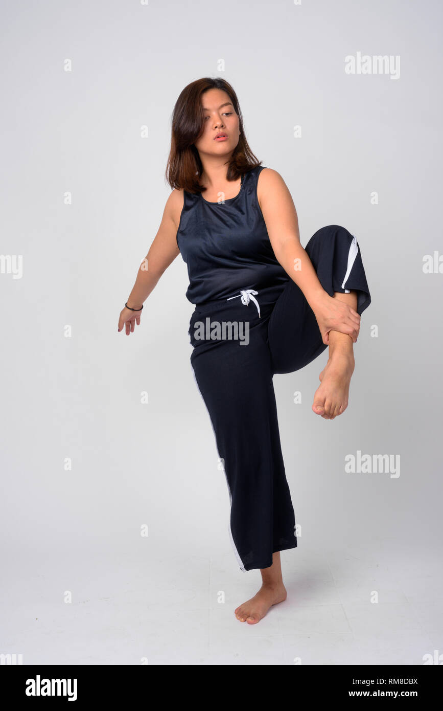 Woman stand on one leg gym hi-res stock photography and images - Alamy