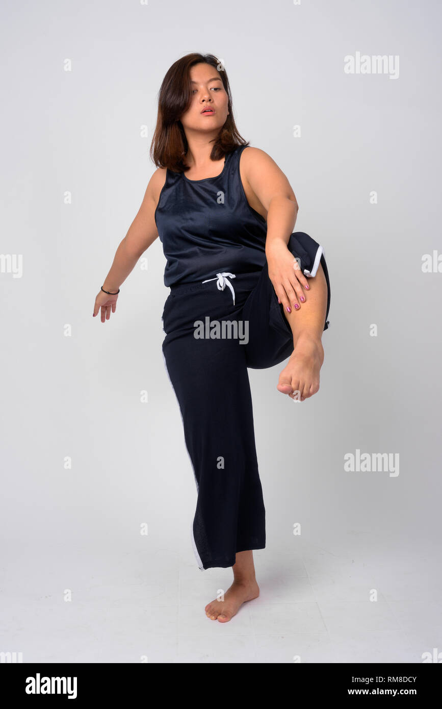 Woman stand on one leg gym hi-res stock photography and images - Alamy