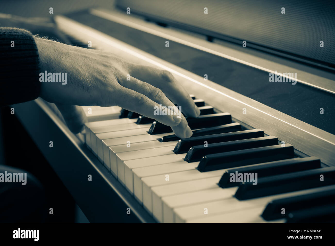 Man hands playing electronic keyboard hi-res stock photography and ...