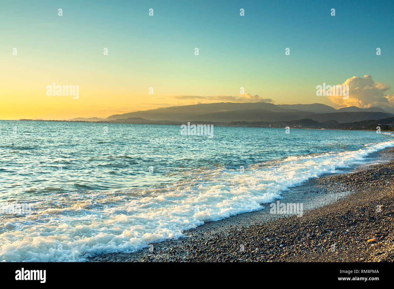 sea landscape with a sunset. evening surf ocean. beautiful scenery with ...