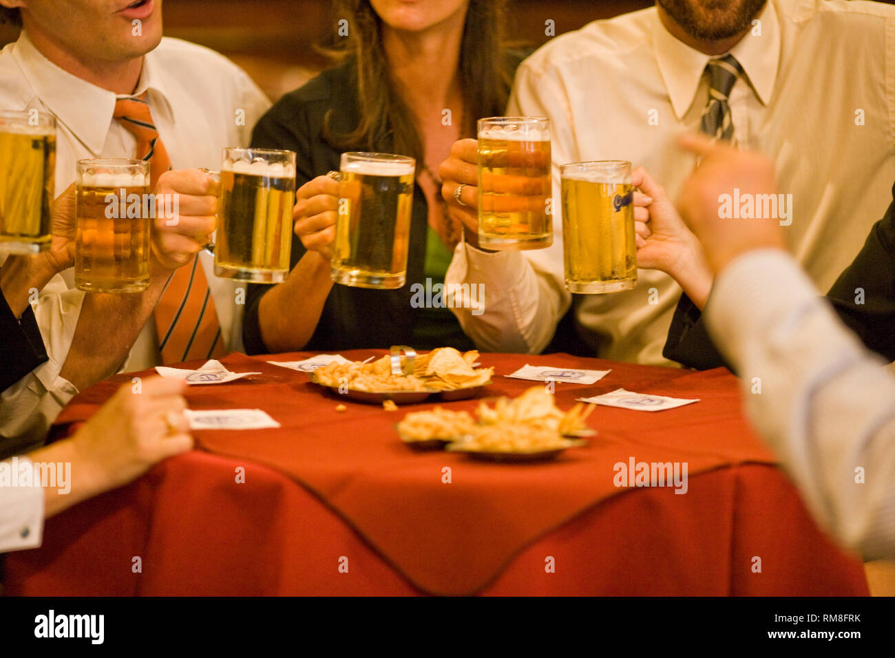 Businessmen celebrating bar hi-res stock photography and images - Alamy