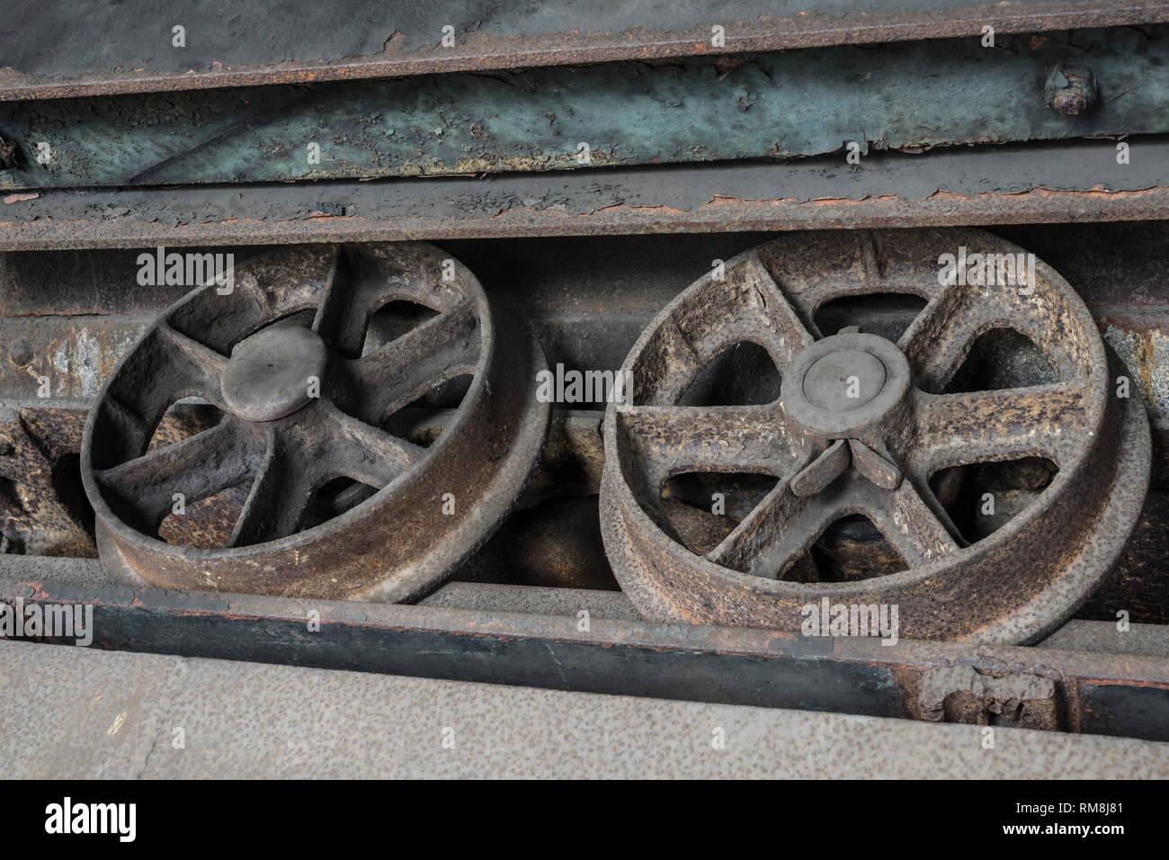 Wheels of an old mining cart Stock Photo - Alamy