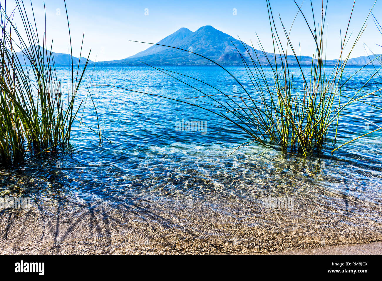 Atitlan & Toliman volcanoes on Lake Atitlan in Guatemalan highlands ...