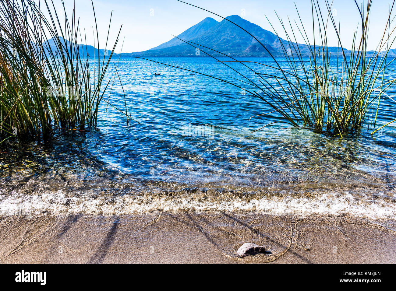 Atitlan & Toliman volcanoes on Lake Atitlan in Guatemalan highlands ...