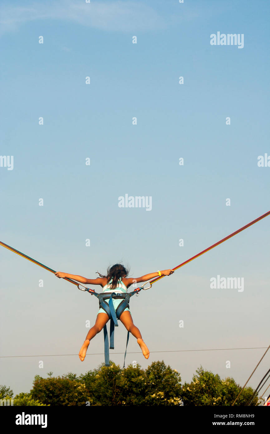 Girl bungee jumping Stock Photo - Alamy