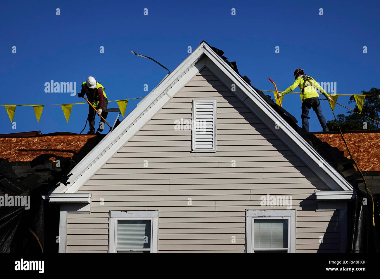 Removing old shingles hi-res stock photography and images - Alamy