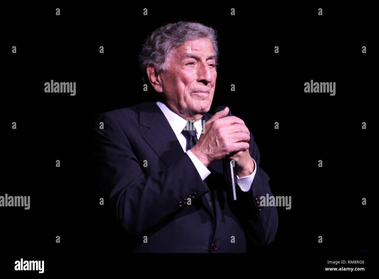 Singer Tony Bennett is shown performing on stage during a "live ...